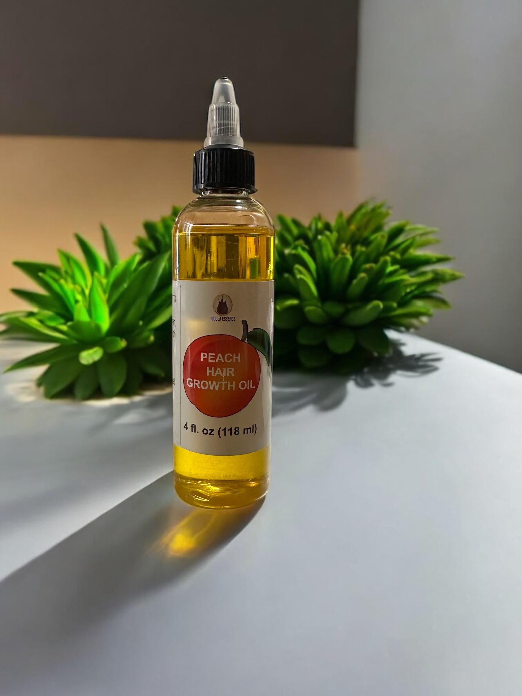 NEW-Peach Hair Growth Oil Available in 1 and 4 oz – Nicola Essence, LLC